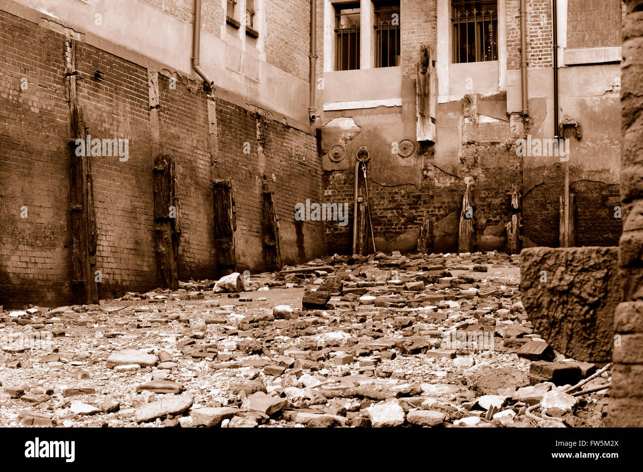 Victorian wharf at low water, with wooden bulwarks and cast iron ...