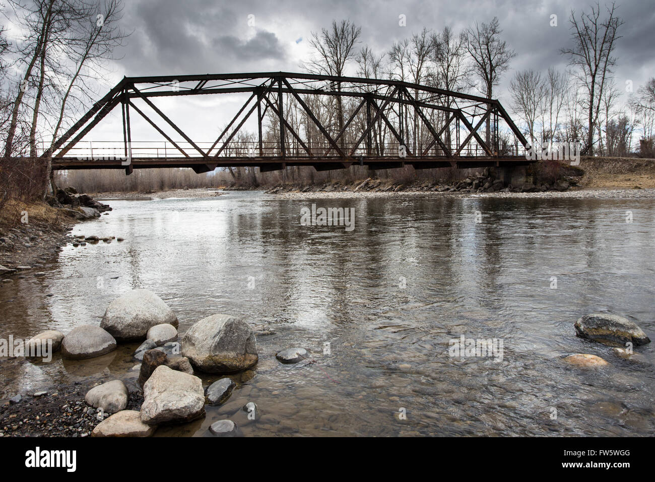 Old vintage trestle bridge across the river Stock Photo - Alamy