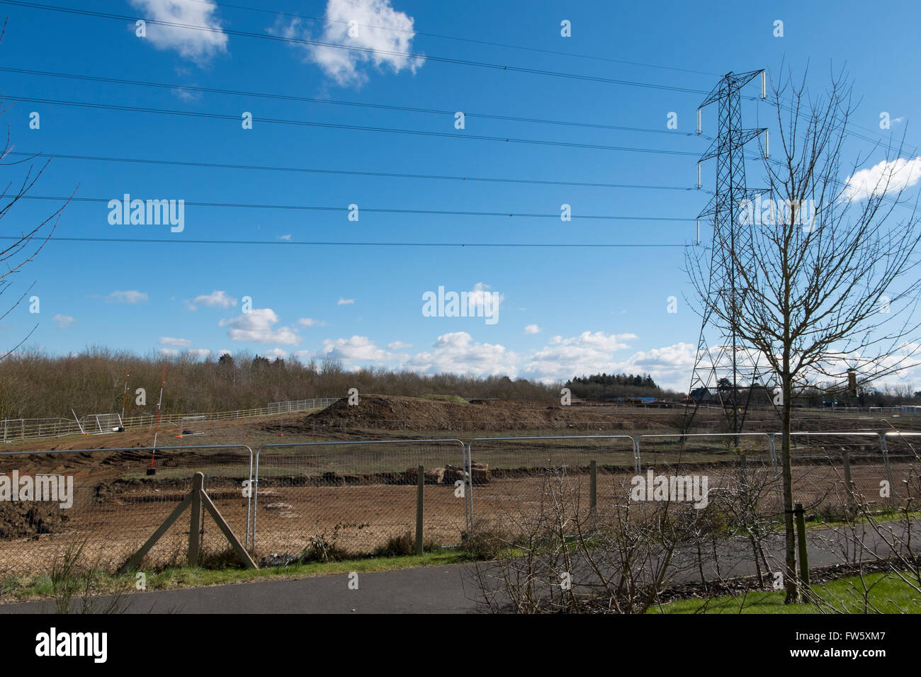House housing electricity pylon hi-res stock photography and images - Alamy