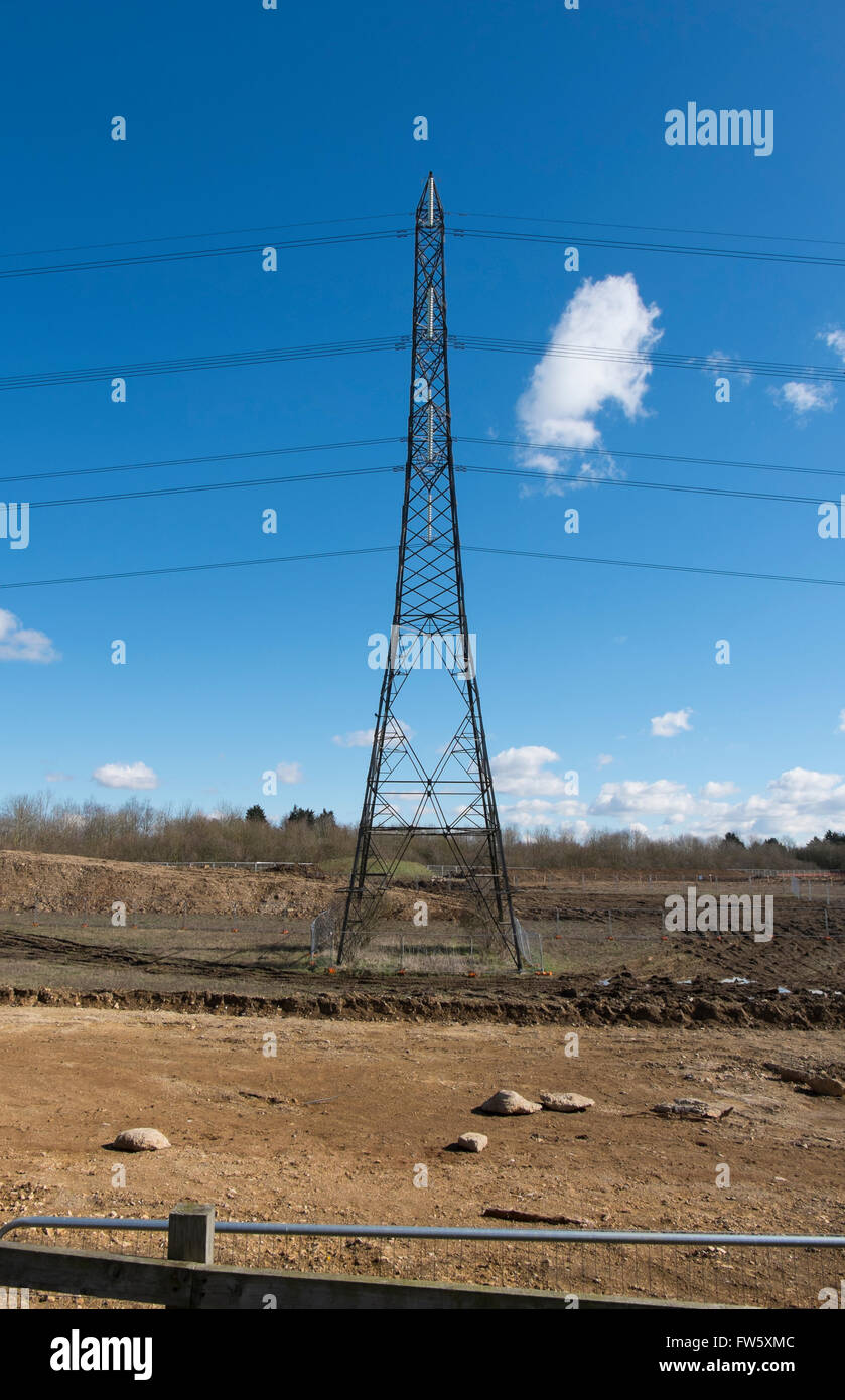 House housing electricity pylon hi-res stock photography and images - Alamy