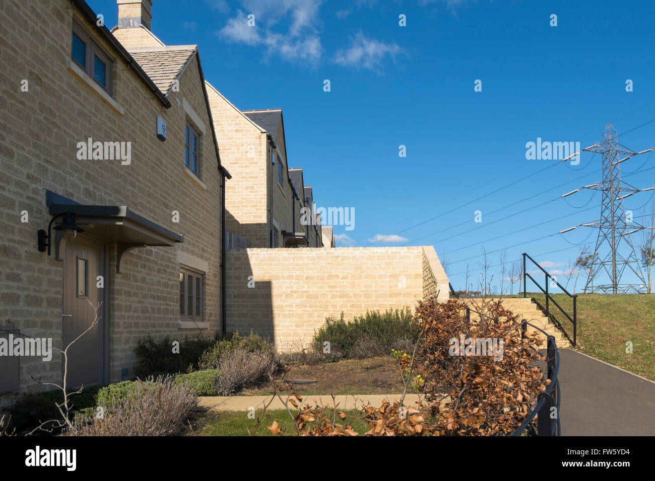Pylon next to houses hi-res stock photography and images - Alamy