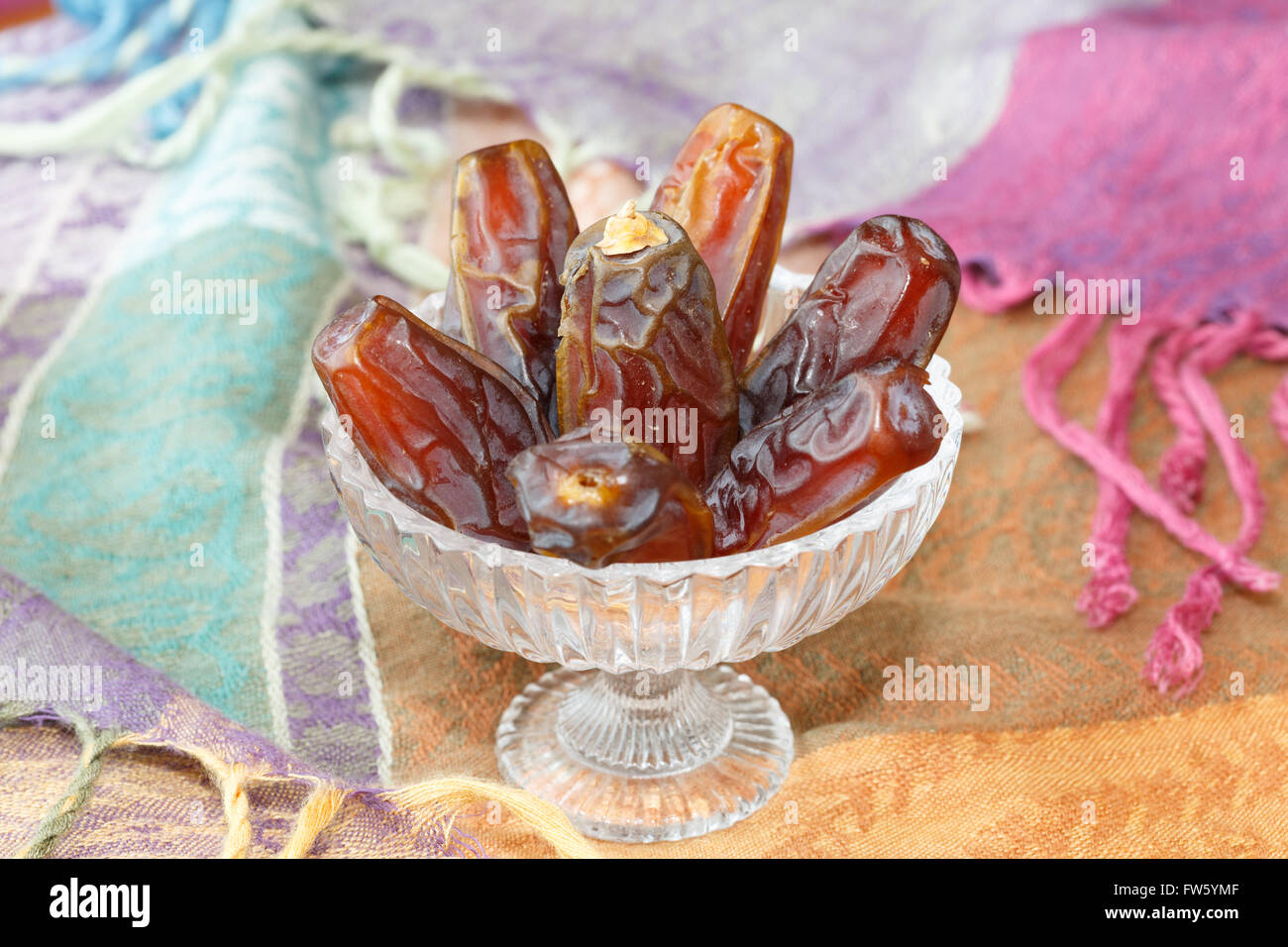 Seven dates placed in glass plate Stock Photo - Alamy