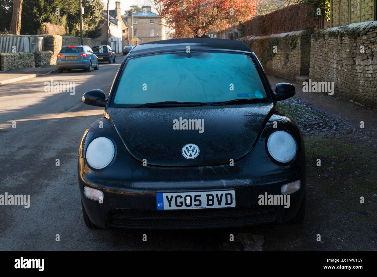 Black VW Beetle Cabriolet with frosty windscreen and headlights parked ...