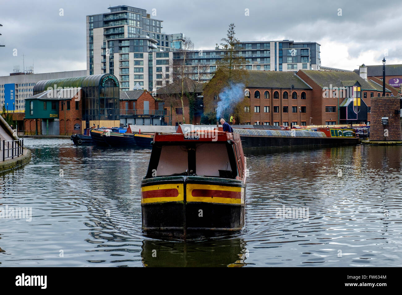 A tourist canal boat on the Birmingham Canal Old Line in central ...