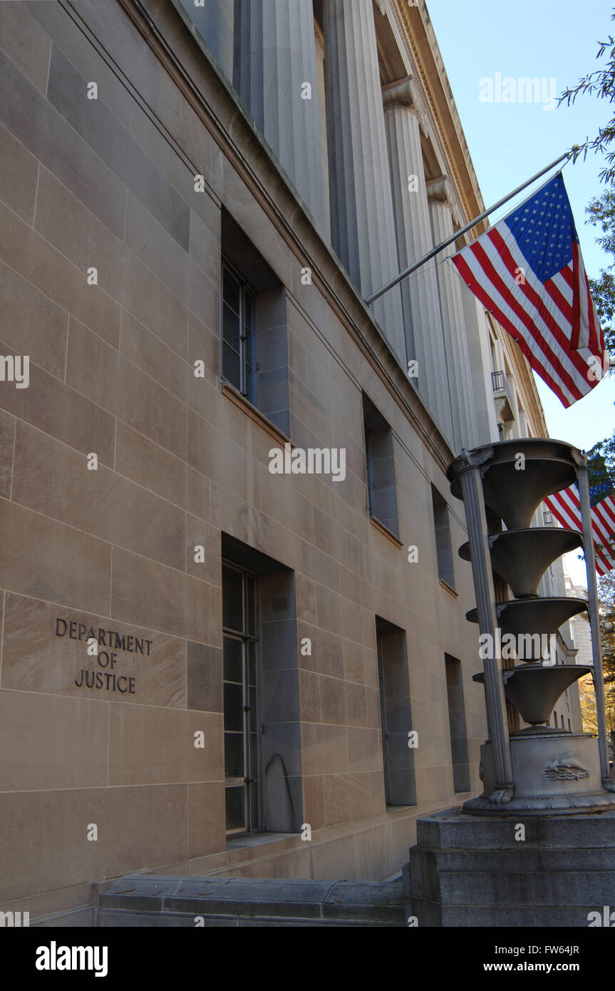 Department of Justice building in Washington DC with American flag ...