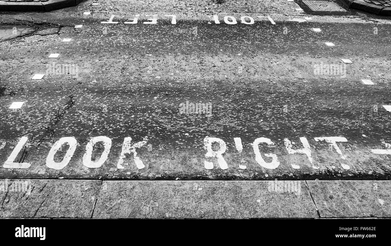 Pedestrian crossing look right Black and White Stock Photos & Images ...