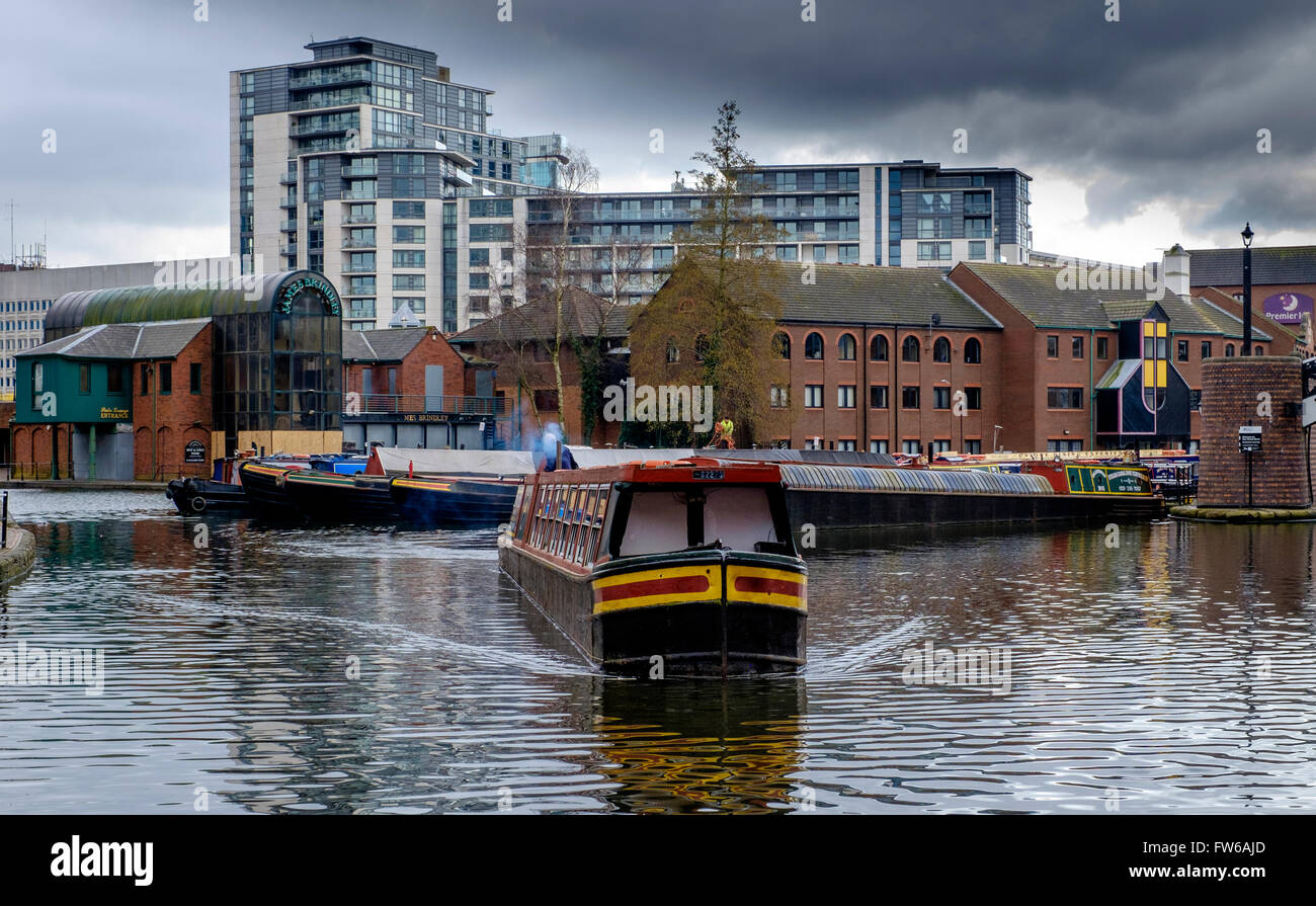 A tourist canal boat on the Birmingham Canal Old Line in central ...