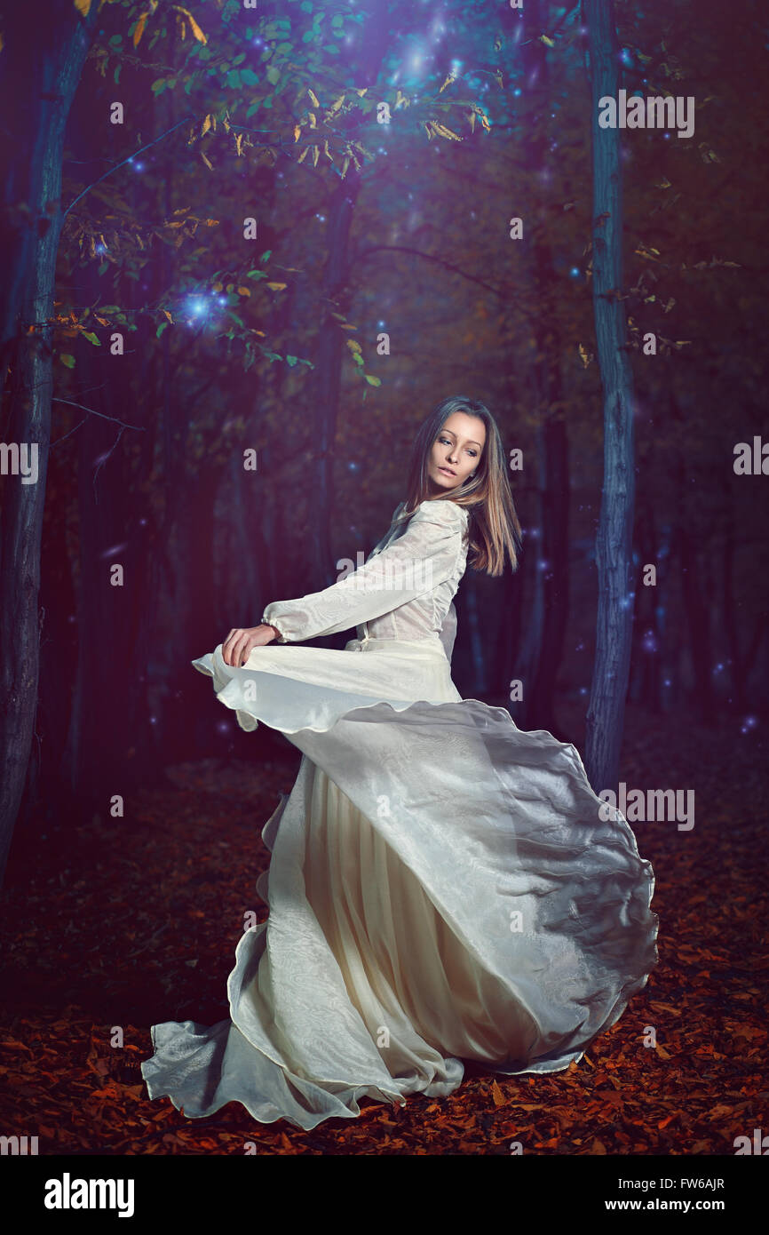 Beautiful woman dancing free forest hi-res stock photography and images ...