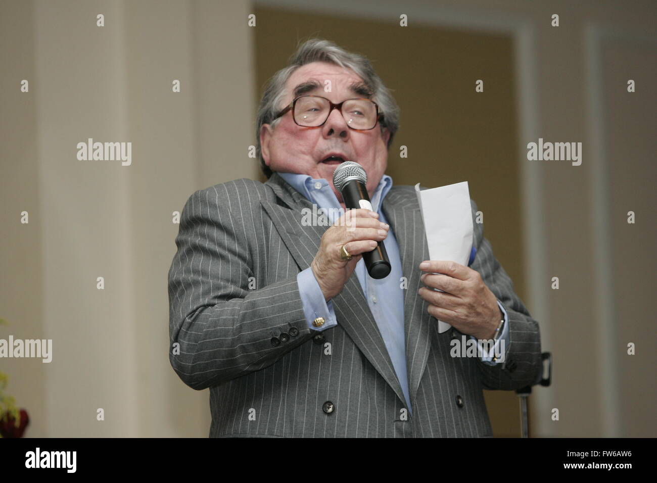 Ronnie Corbett, British comedian, entertaining an audience at an after ...