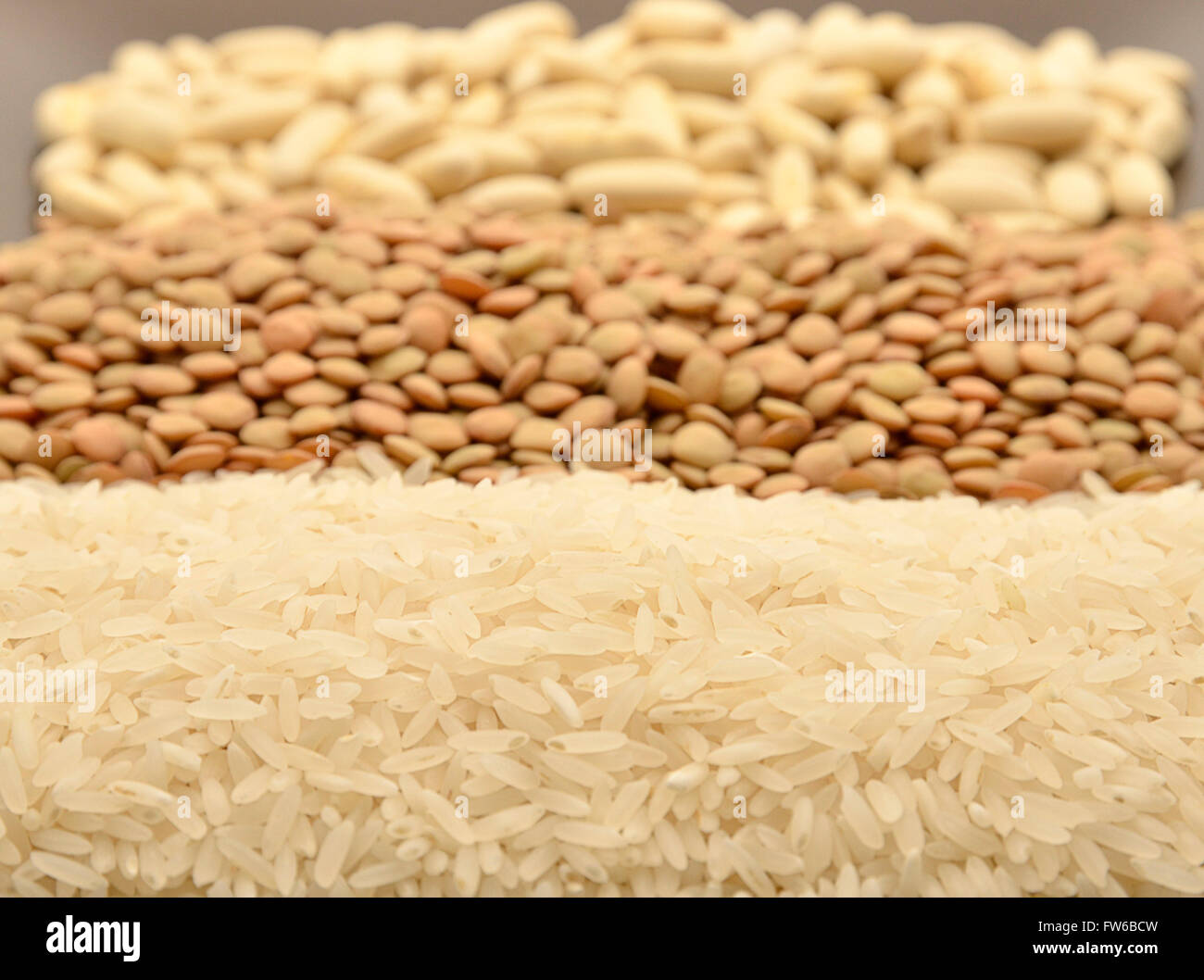 various legumes, focus on rice Stock Photo - Alamy