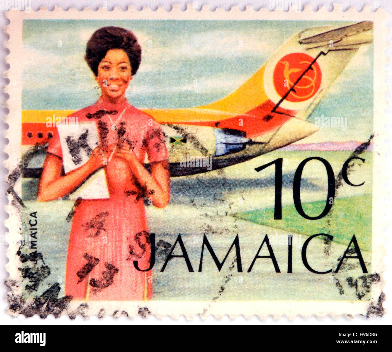 JAMAICA - CIRCA 1972: Stamp printed in Jamaica shows A Flight Attendant ...