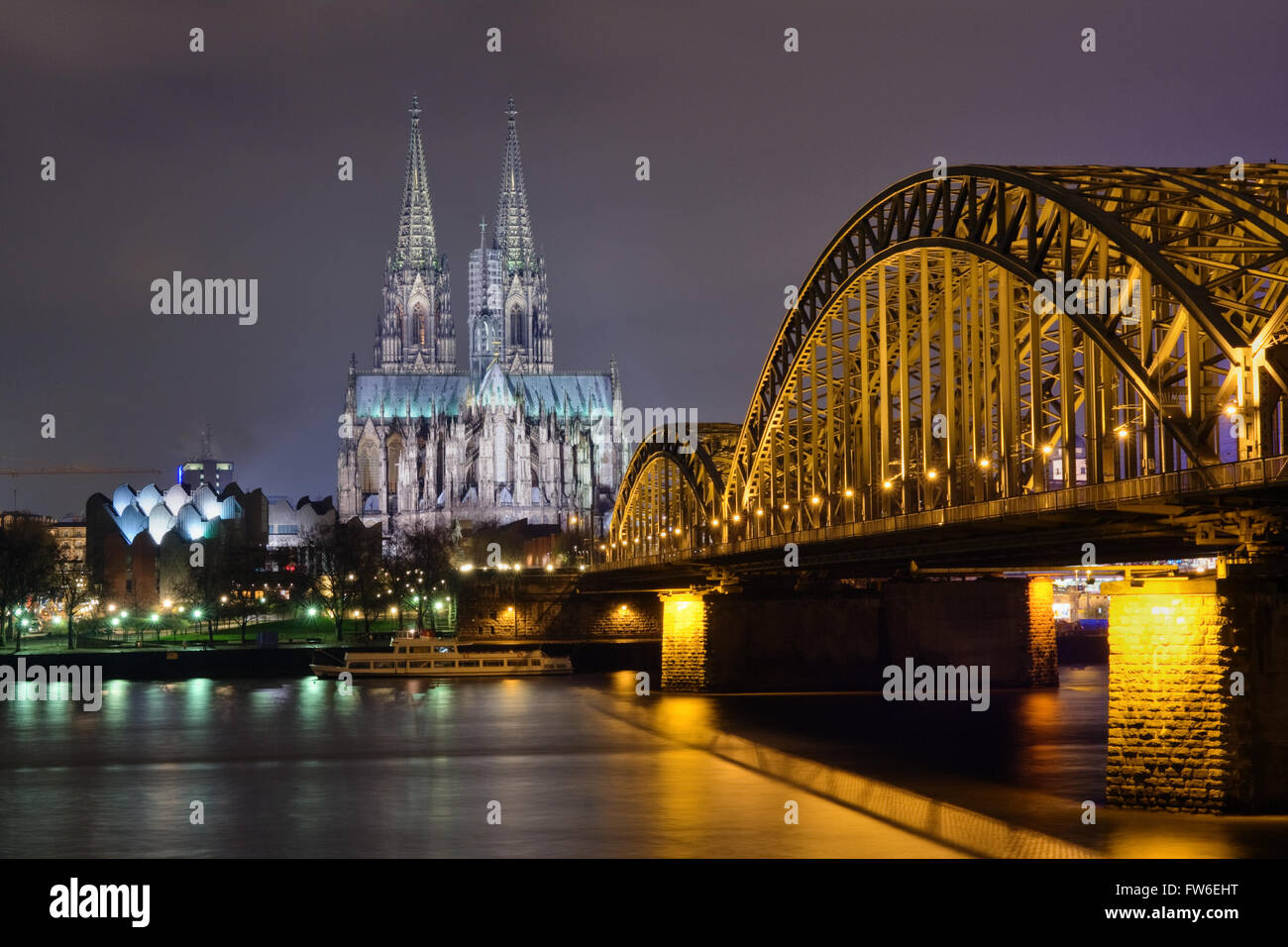 Cologne cathedral and railway bridge at night Stock Photo - Alamy