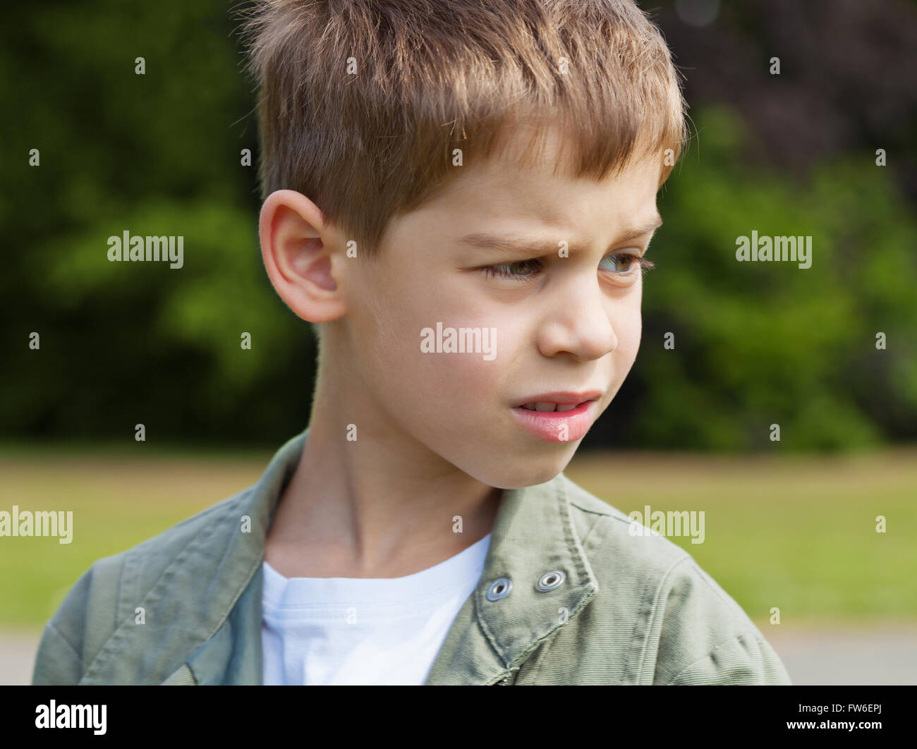 Side portrait boy walking hi-res stock photography and images - Alamy
