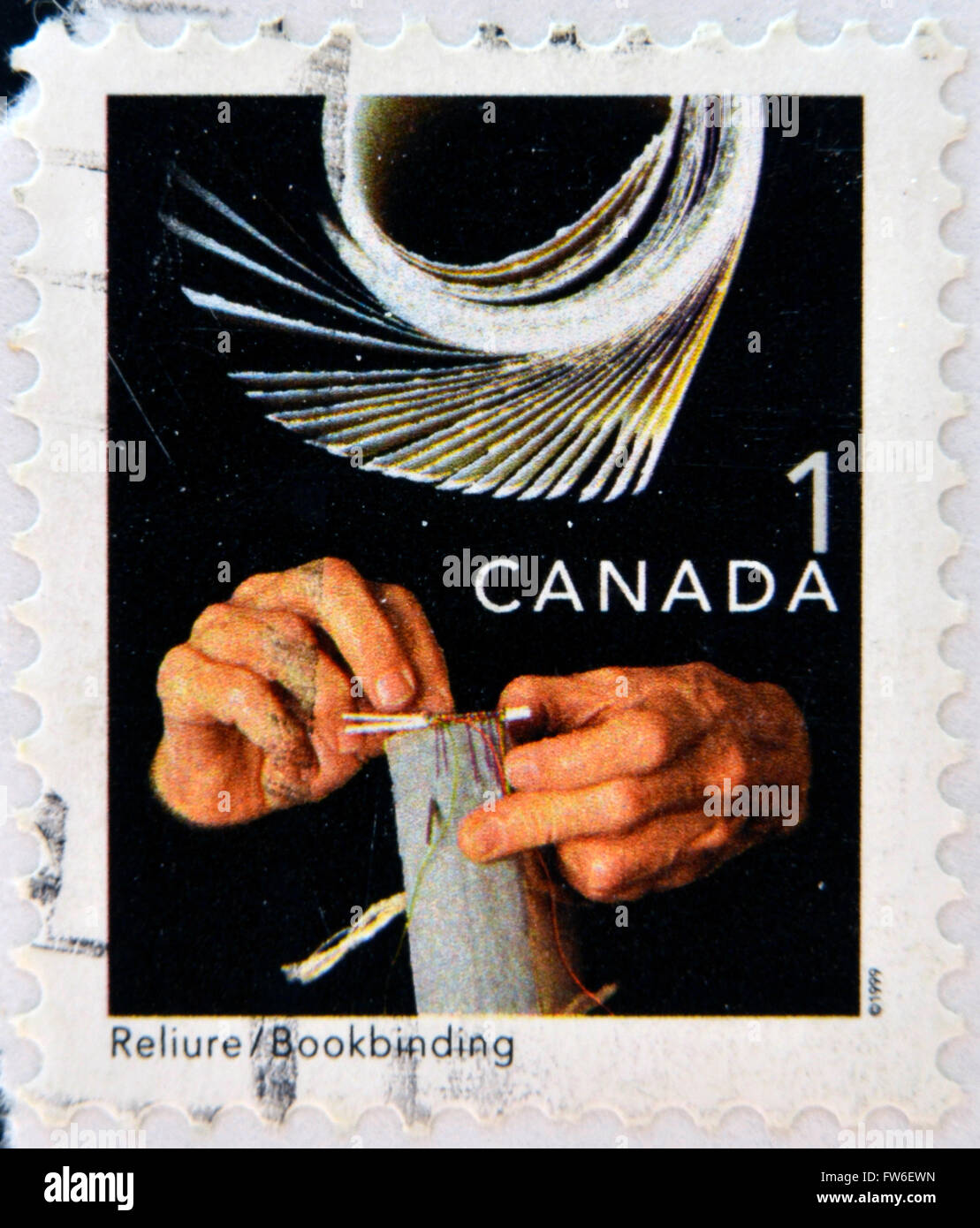 CANADA - CIRCA 1999: A stamp printed in Canada, shows bookbinging ...