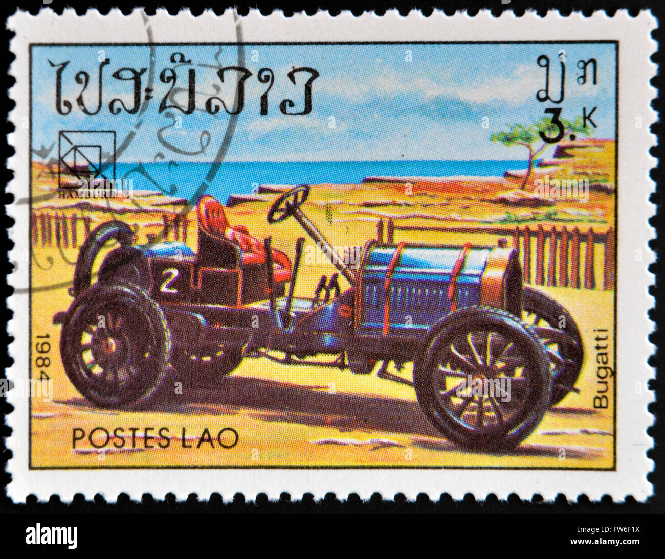 LAOS - CIRCA 1984: A stamp printed in Laos shows retro car, Bugatti ...