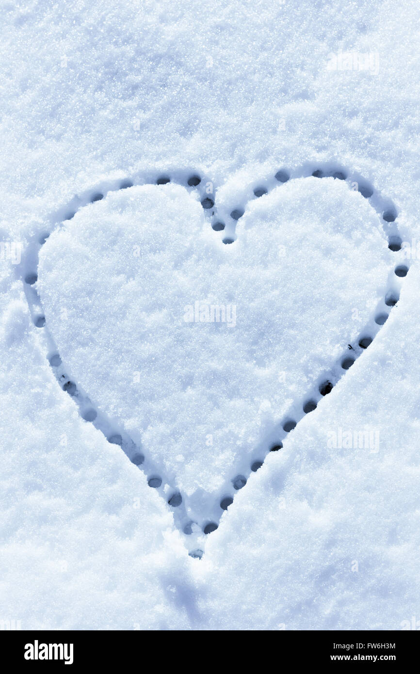 Snow with drown heart shape Stock Photo - Alamy