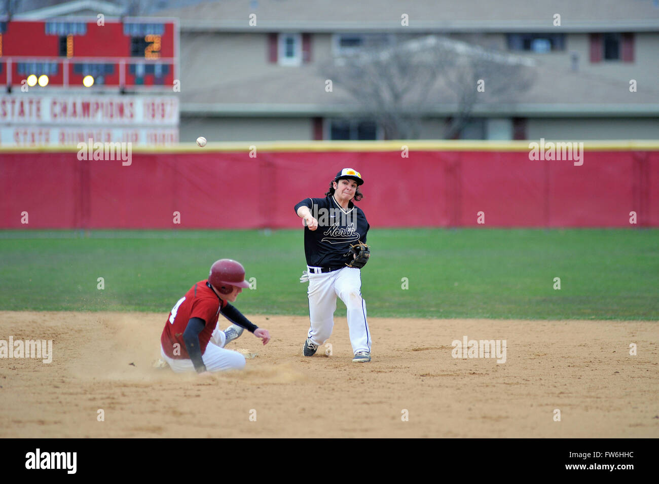 High school second baseman backs off the second base bag after retiring ...