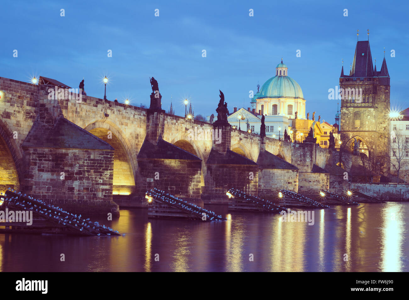 Scenic view of the Old Town architecture over Vltava river in Prague ...