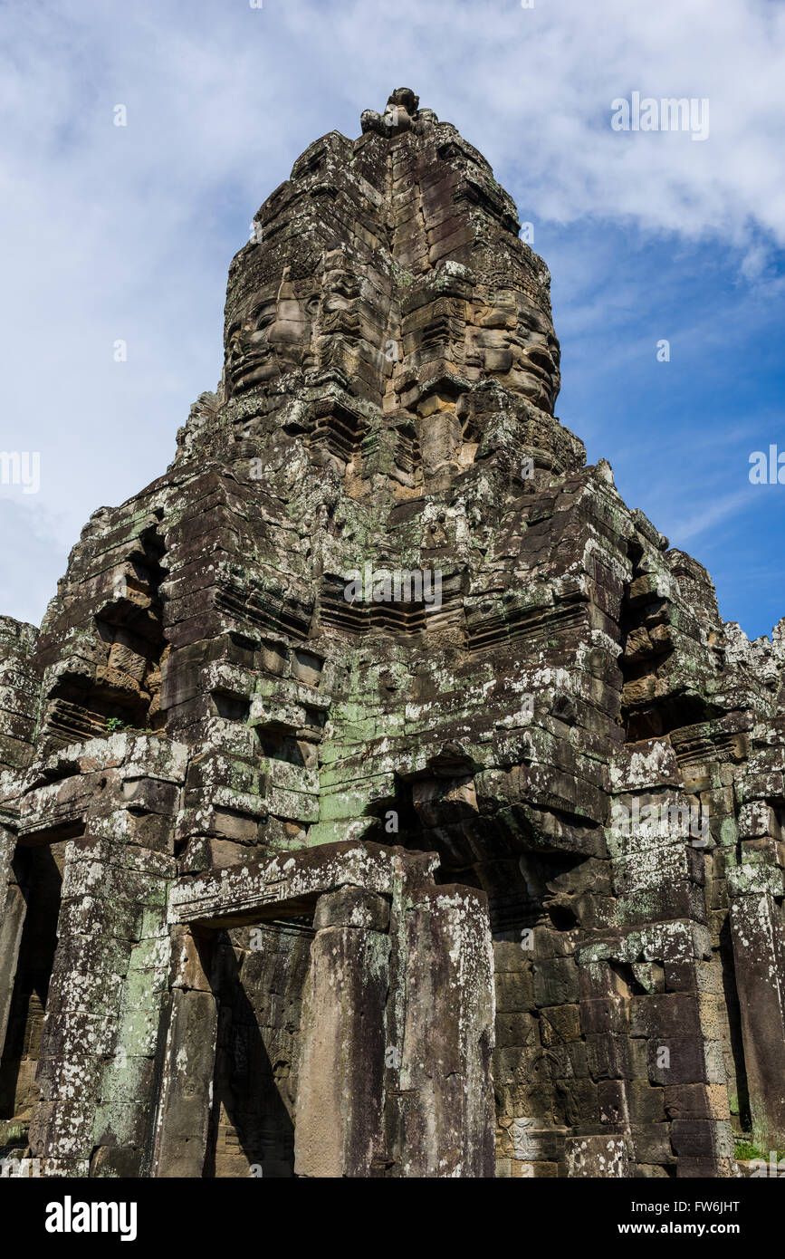 Majestic stone carvings and towers of Bayon Temple at Angkor Thom Stock ...