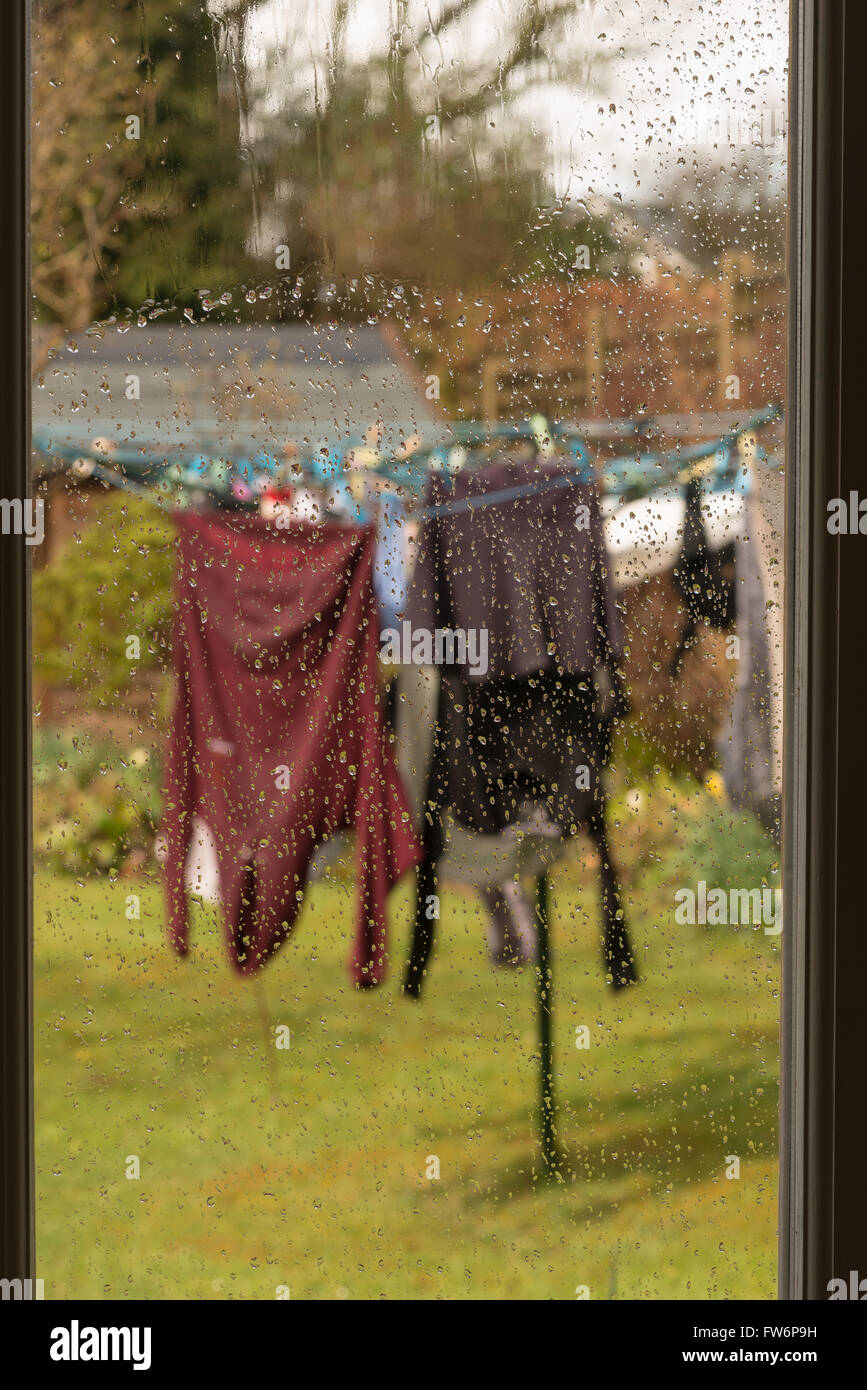 Bad timing washing out to dry on rotary drier is soaked as it showers ...