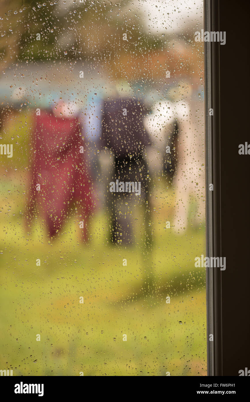 Bad timing washing out to dry on rotary drier is soaked as it showers ...