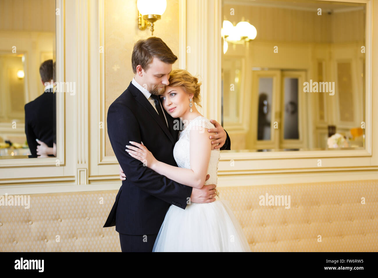 Couple hugging and inside hi-res stock photography and images - Alamy