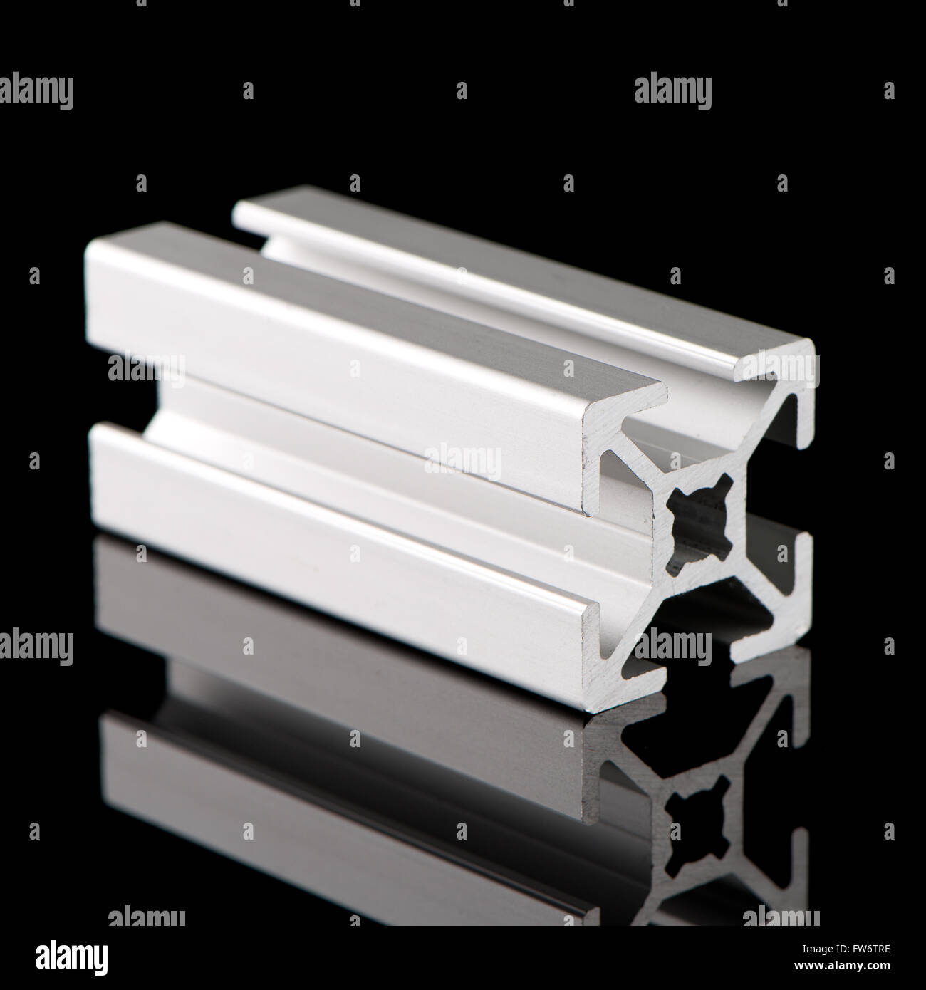Aluminium profile sample isolated on black background Stock Photo - Alamy