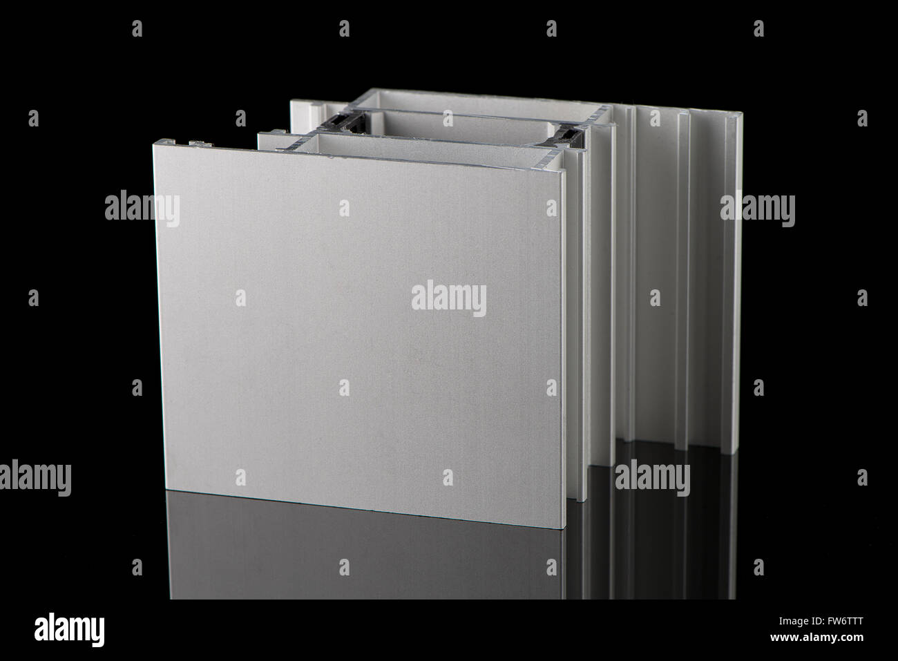 Aluminium profile sample isolated on black background Stock Photo - Alamy