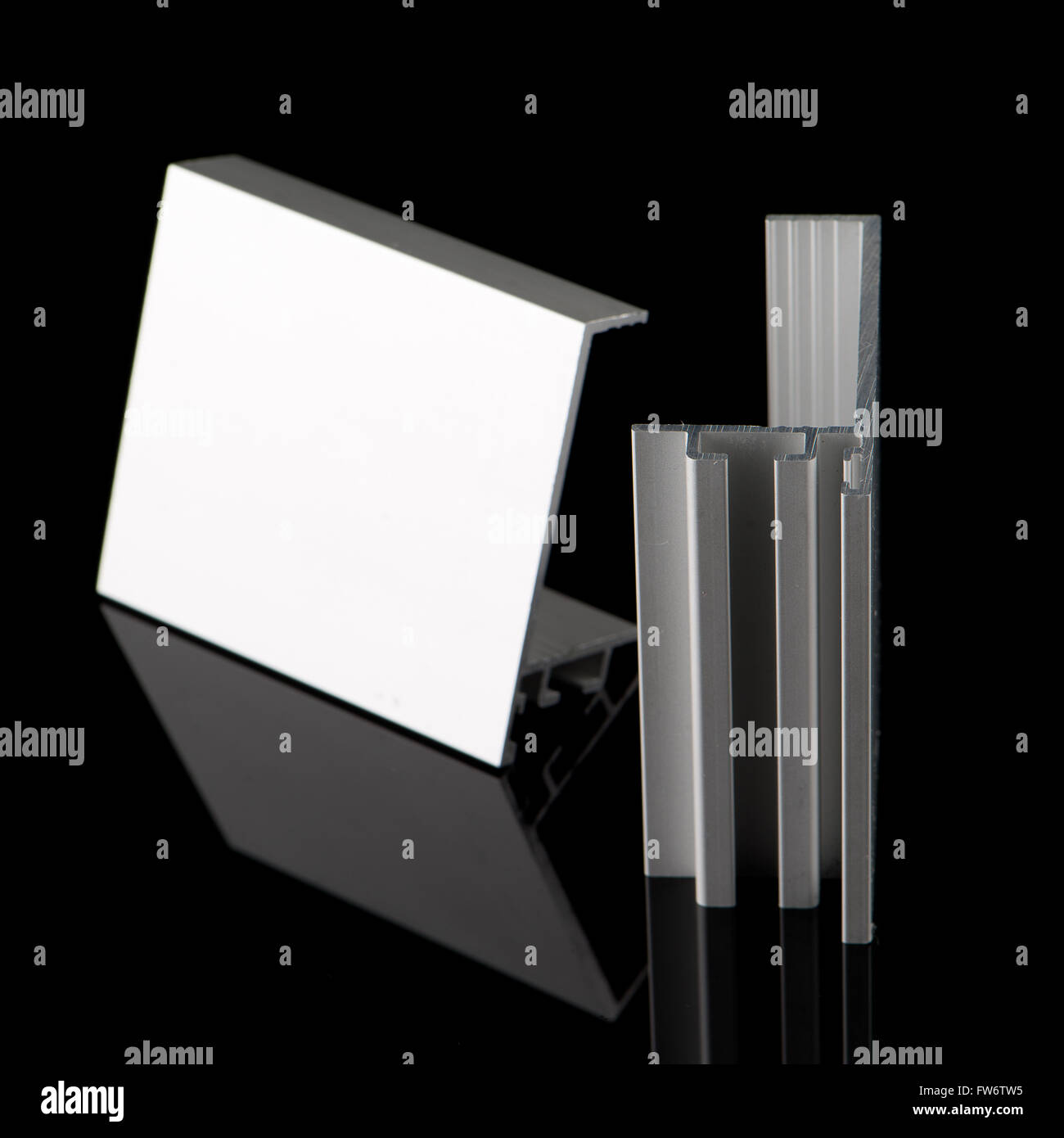 Aluminium profile sample isolated on black background Stock Photo - Alamy
