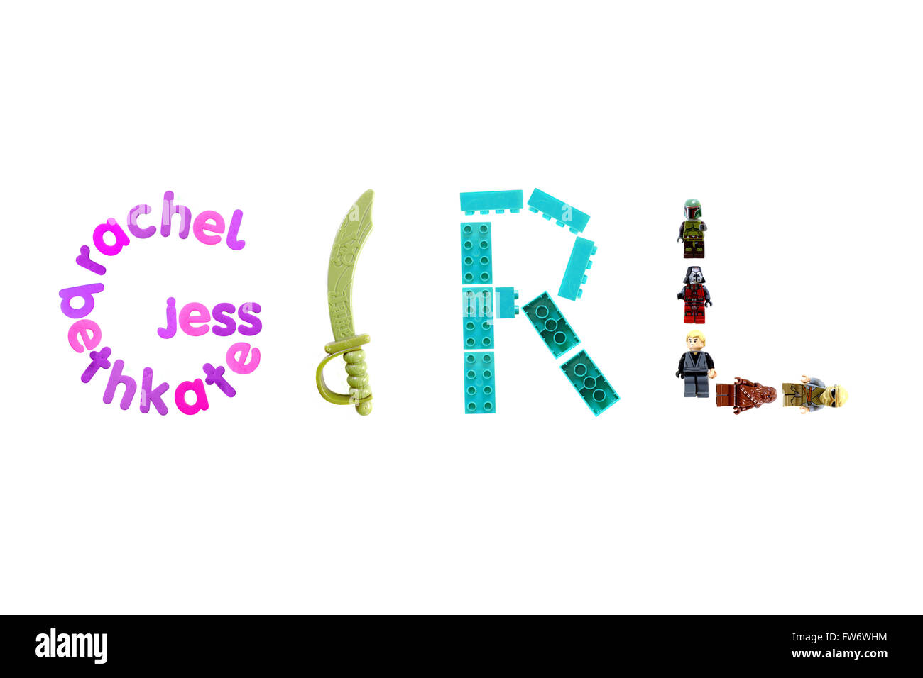 The word GIRL created from child's toys photographed against a white ...