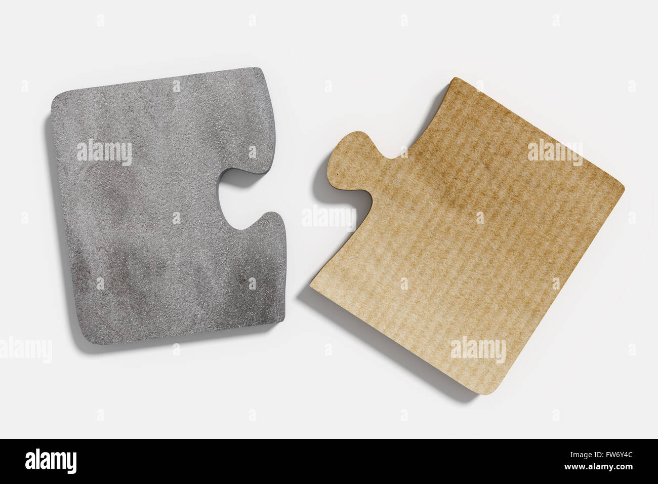 3d rendering of two puzzle pieces made of paperboard and stone material ...