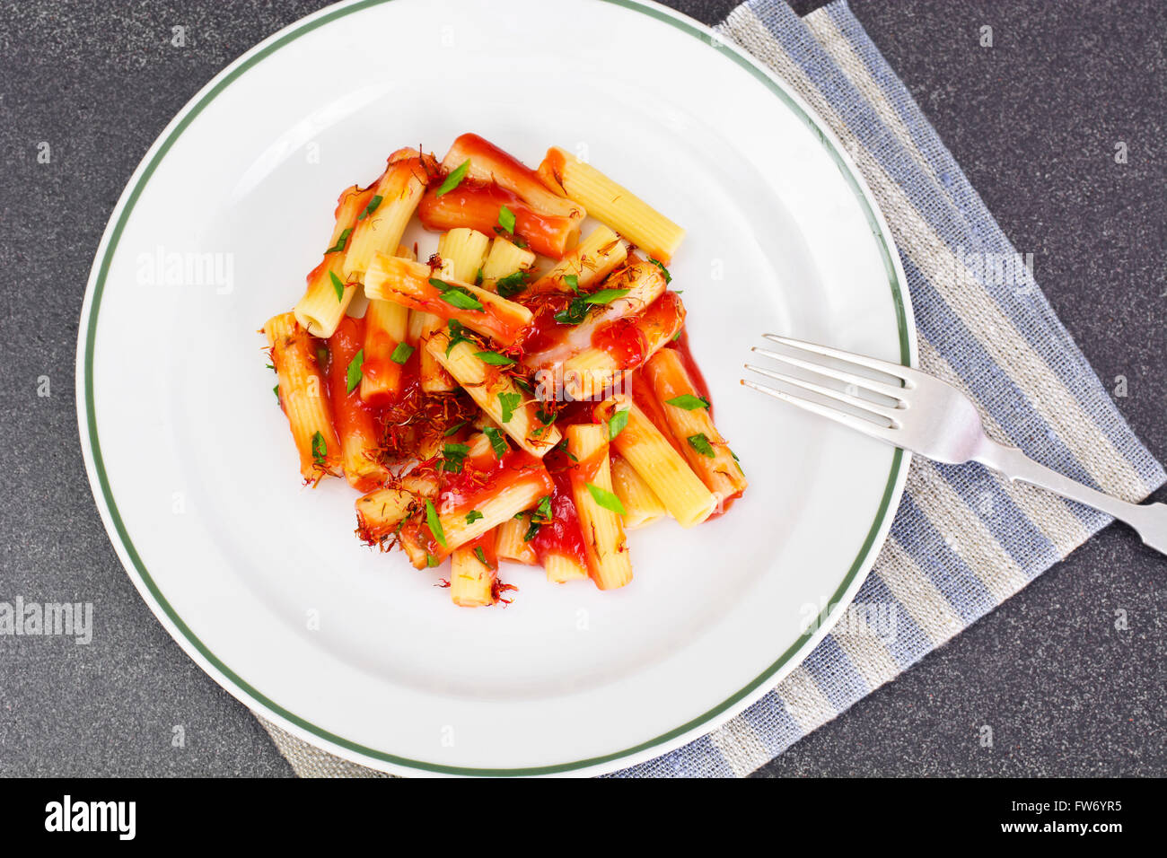 Pasta with Tomato Sauce Ketchup and Saffron Stock Photo - Alamy