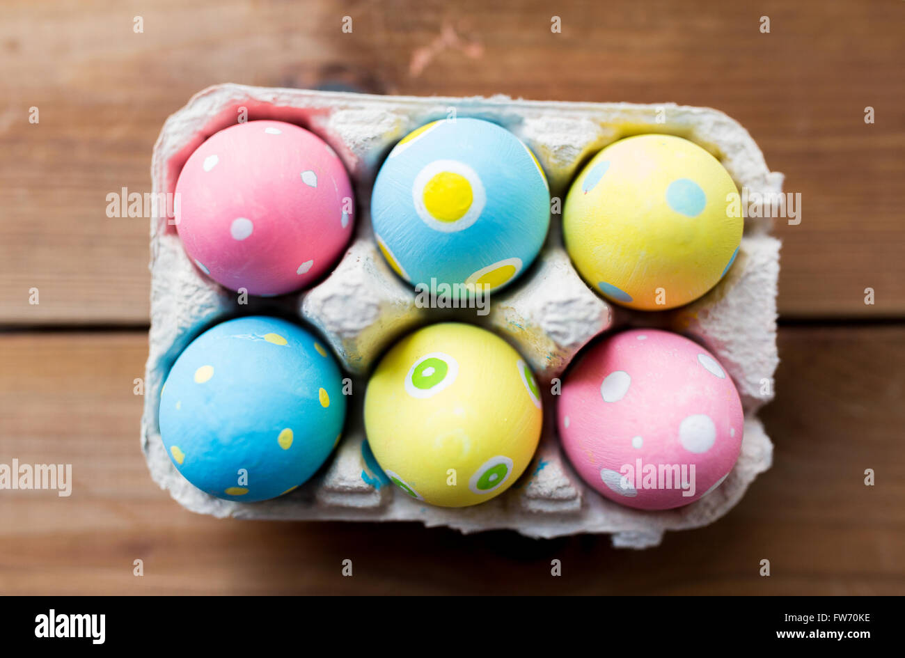 close up of colored easter eggs in egg box Stock Photo - Alamy