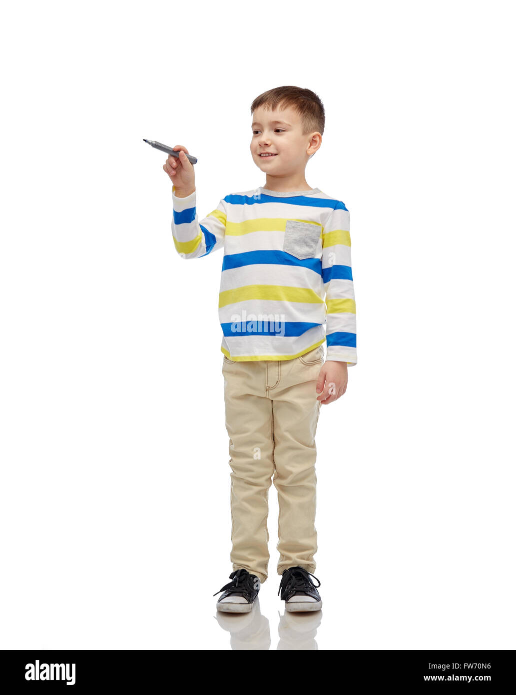 little boy drawing or writing with marker Stock Photo - Alamy