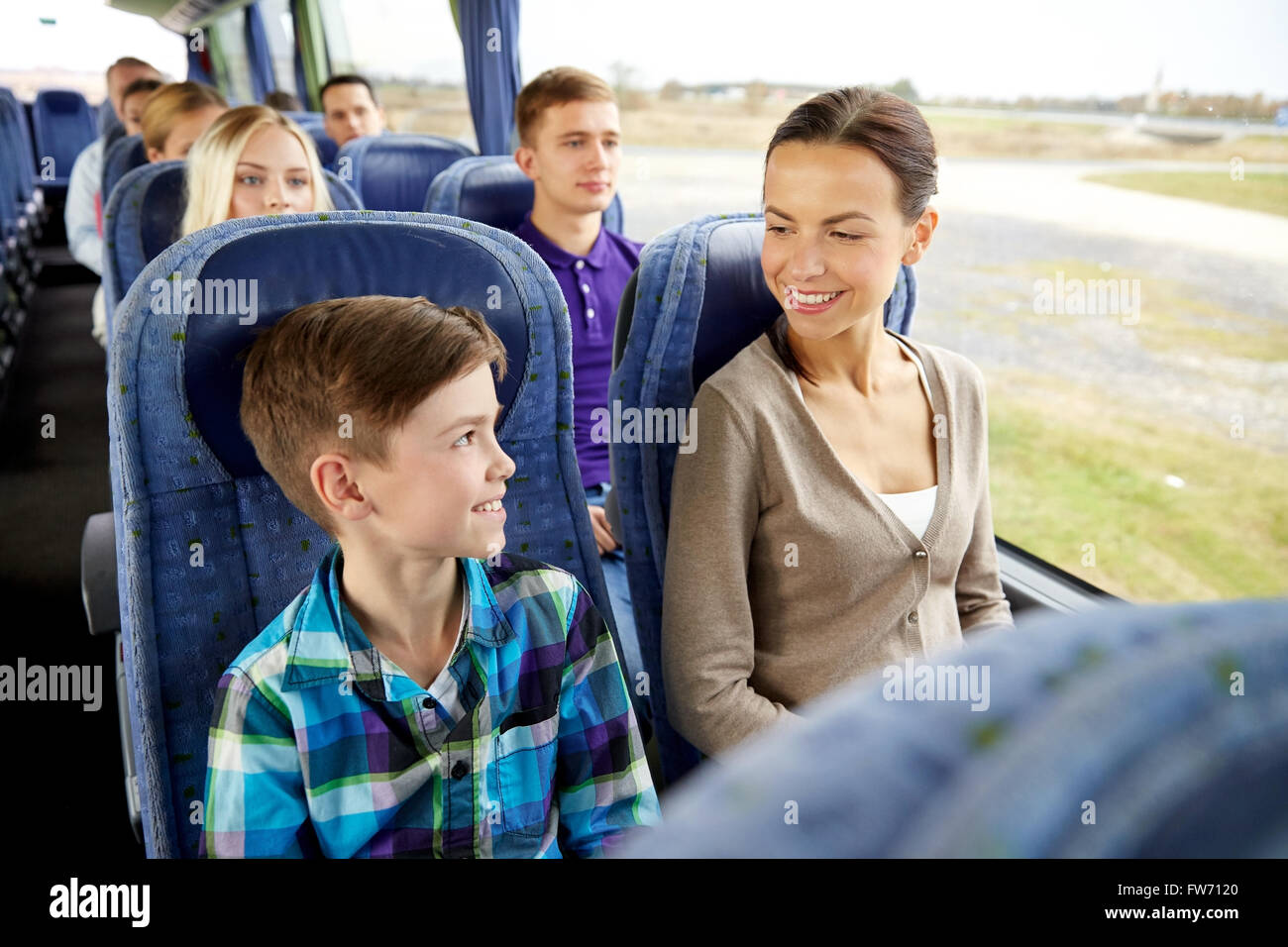 Happy people riding bus hi-res stock photography and images - Alamy