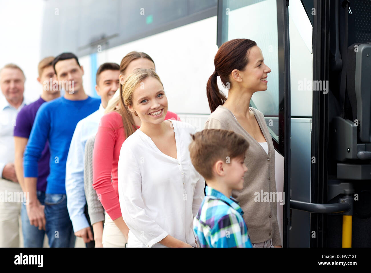 group of happy passengers boarding travel bus Stock Photo - Alamy