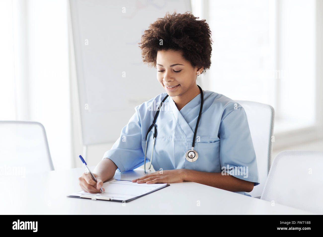 Nurse Writing Notes High Resolution Stock Photography and Images - Alamy