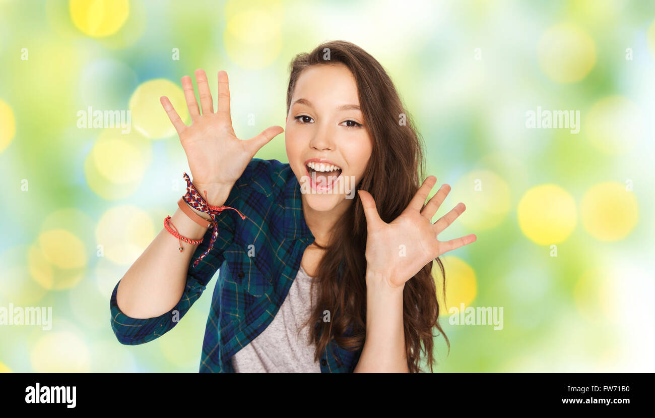 happy laughing pretty teenage girl showing hands Stock Photo - Alamy