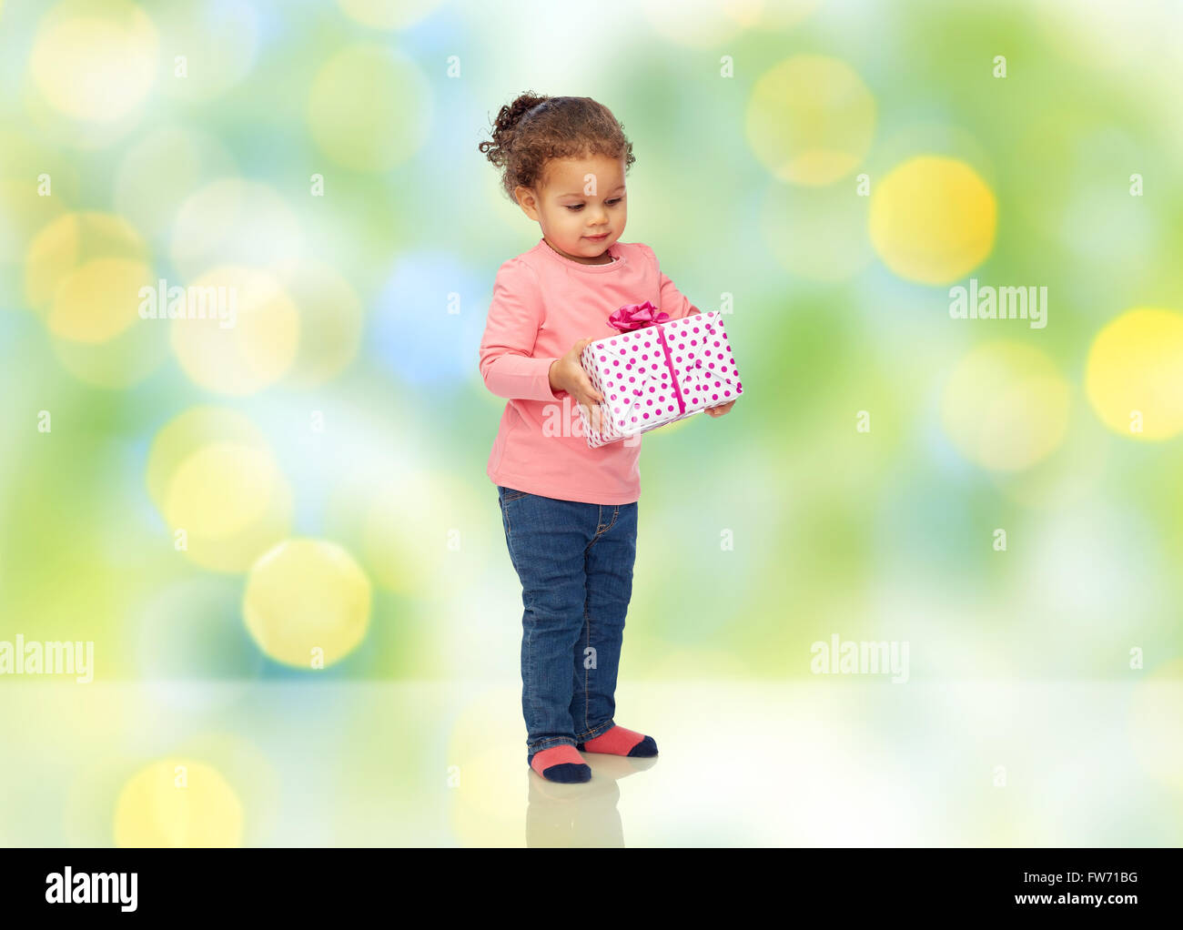 beautiful little baby girl with birthday present Stock Photo - Alamy