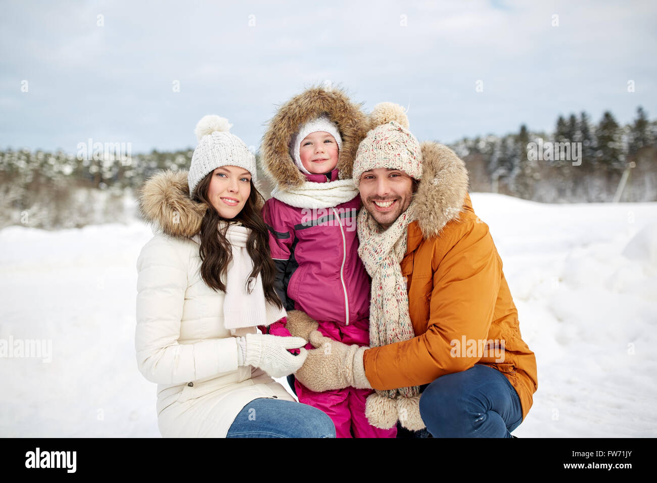 happy family with child in winter clothes outdoors Stock Photo - Alamy
