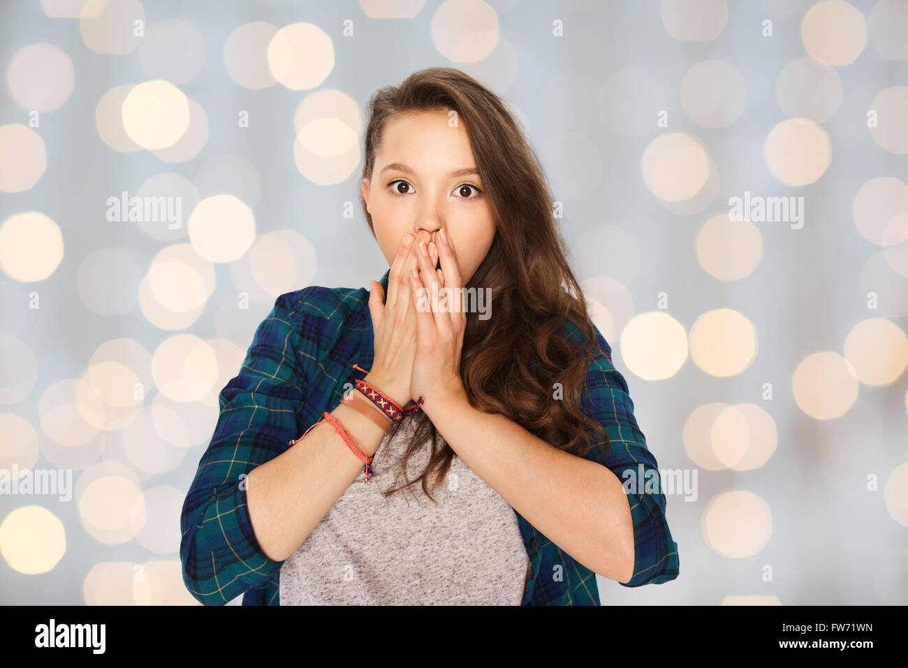 scared teenage girl over holidays lights Stock Photo - Alamy