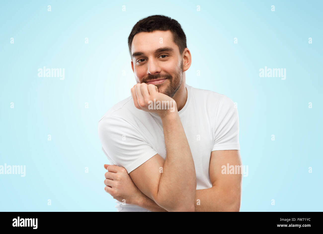 smiling man over blue background Stock Photo - Alamy