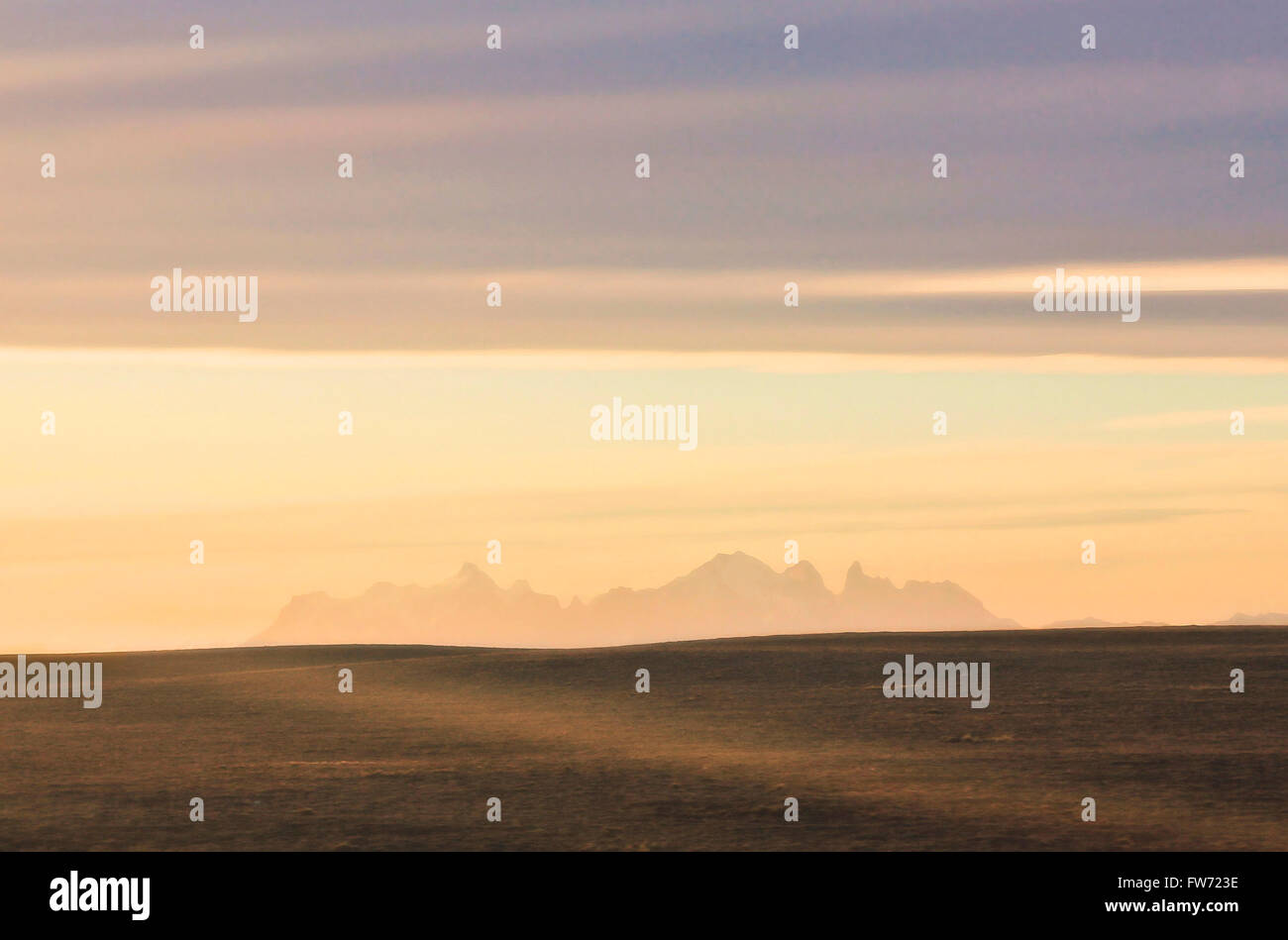 background silhouette of colorfull sunset above patagonia mountains ...