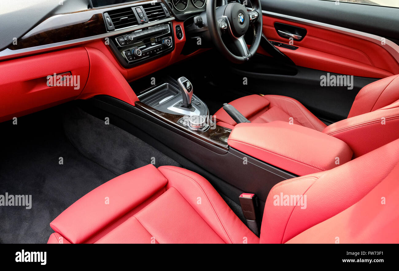 Cockpit view of an expensive German sports coupe showing the red ...