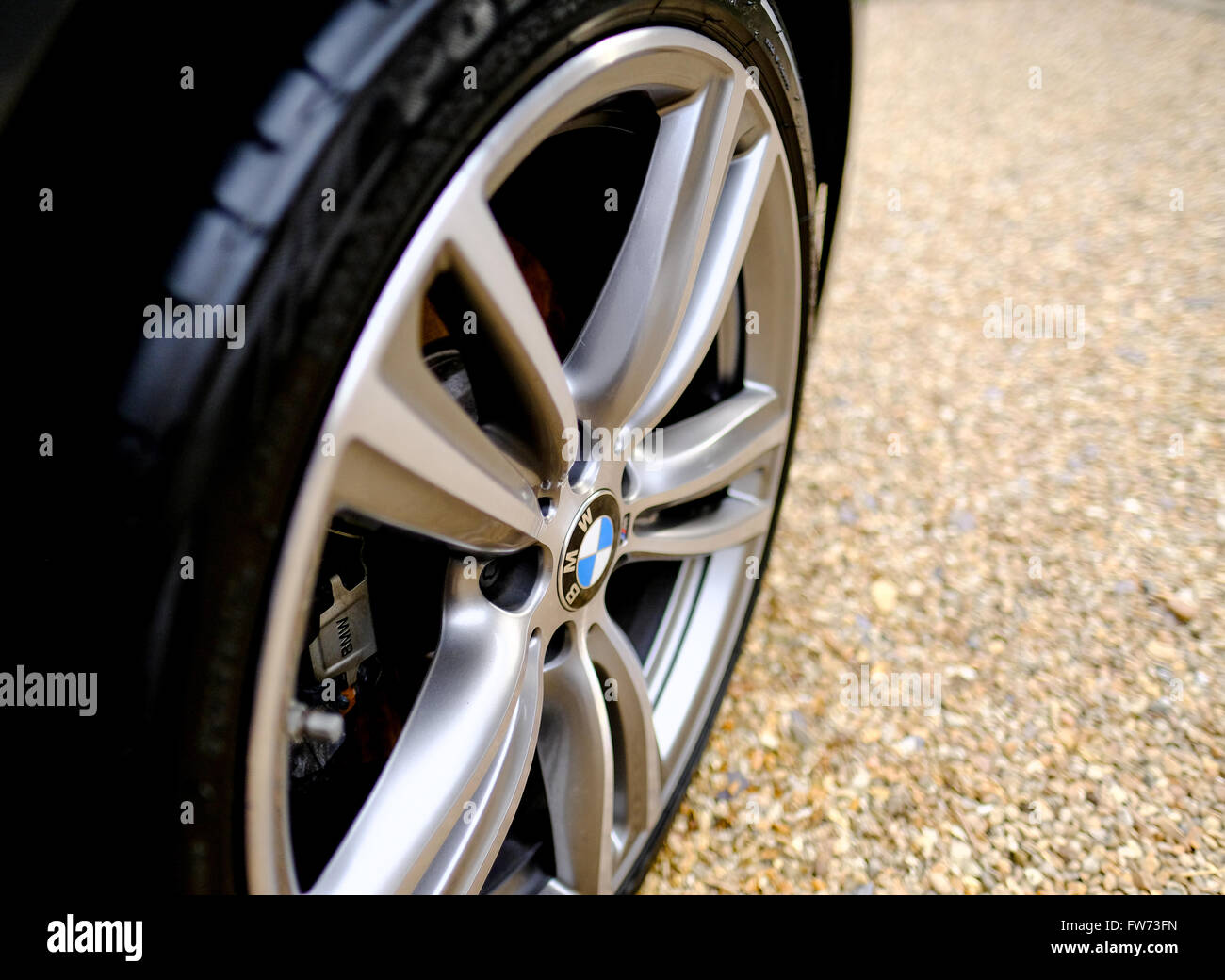 Large, 19-inch alloy sports wheel and low profile tyre seen on a well ...