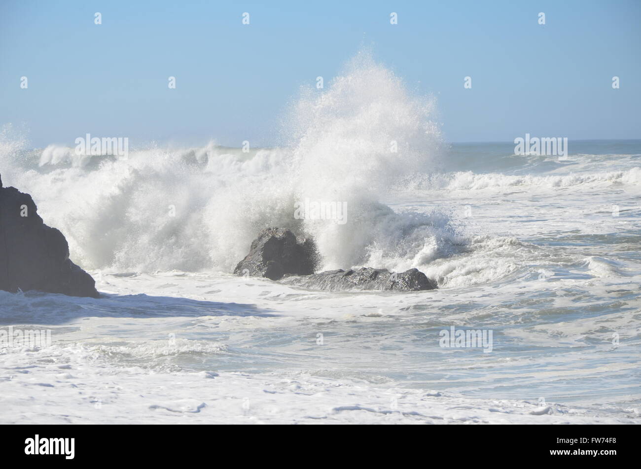 Waves crashing on a beach along the Pacific Coast Highway in Northern ...