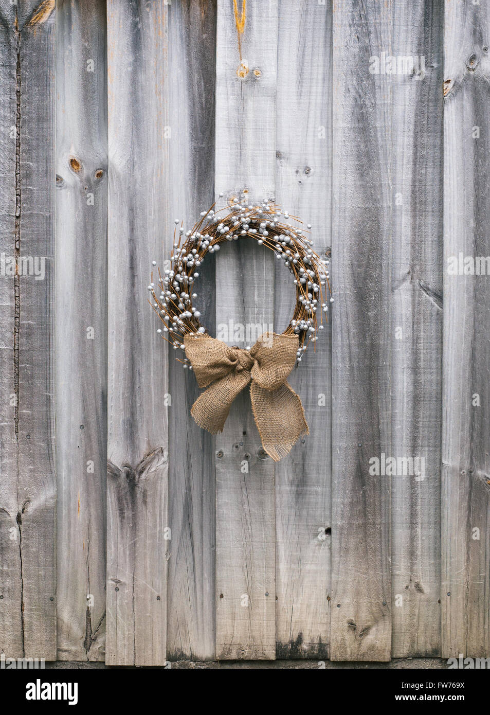 Rustic Christmas wreath on weathered wooden background Stock Photo - Alamy