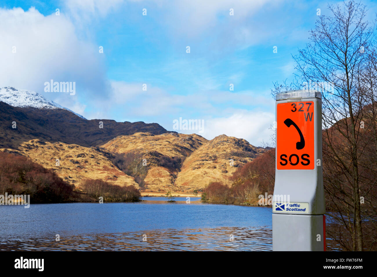 SOS phone sign and Loch Elit, near Lochailort, Scottish Highlands ...