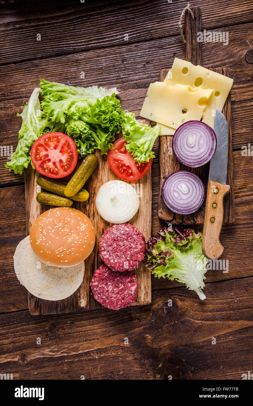 Homemade burgers ingredients on wooden rustic table Stock Photo - Alamy