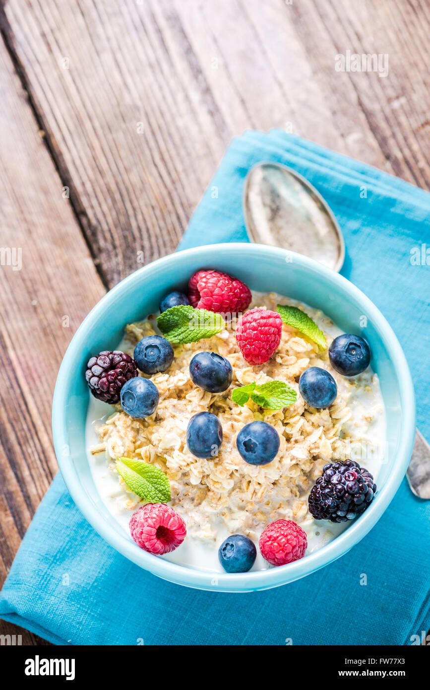Tasty and light diet cereal breakfast with sumer fruits, fresh milk and ...